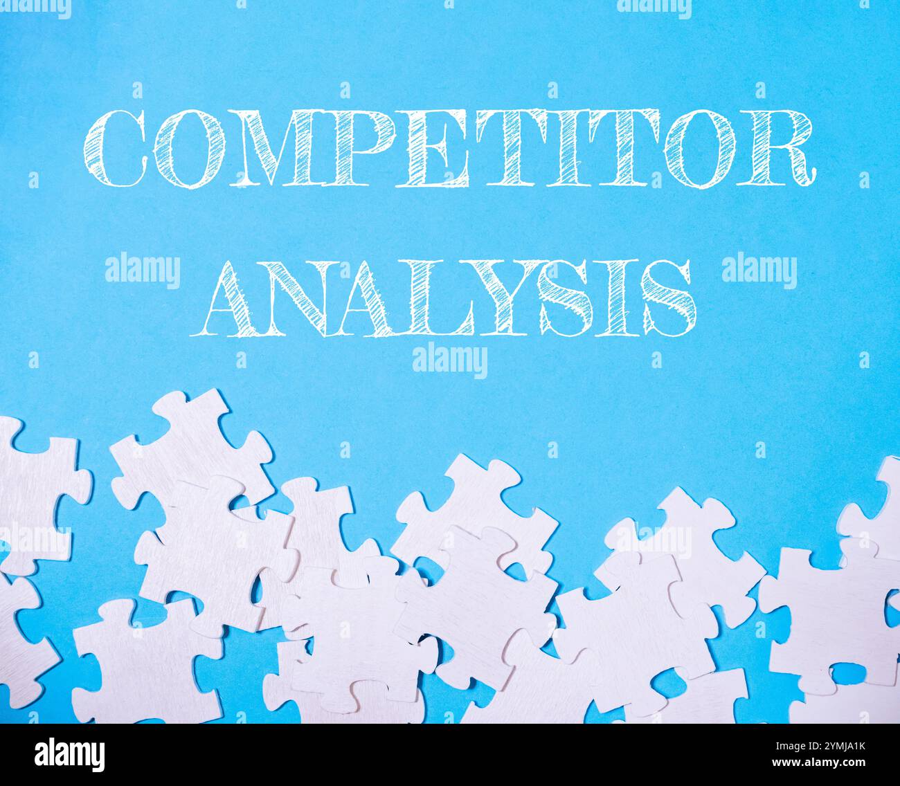 Blue background with white puzzle pieces and the word competitor ...