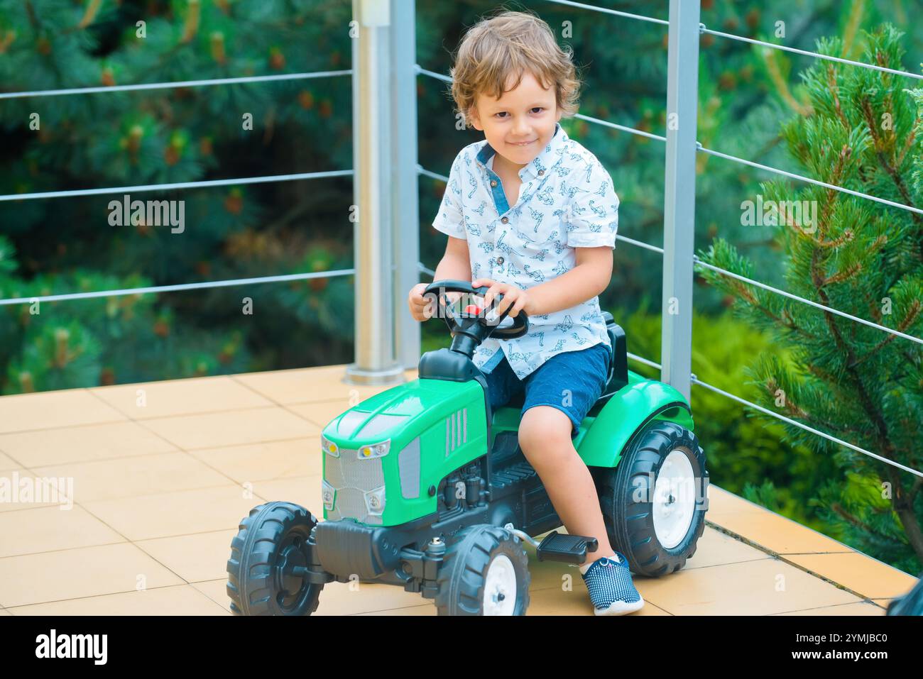 Little Driver. Cute little baby boy pretending to drive. Kid in car ...