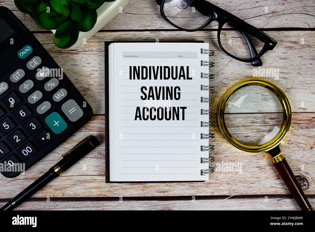 Individual Saving Account (ISA) text on notepad, Business and Financial ...