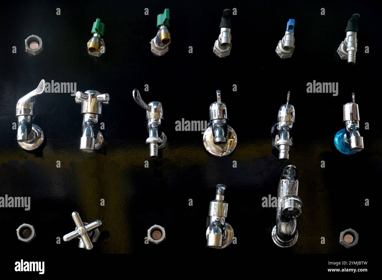 display or examples of water tap on store Stock Photo - Alamy