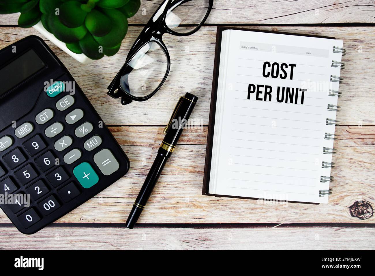 Cost Per Unit (CPU) text on notepad, Business and Financial concept ...