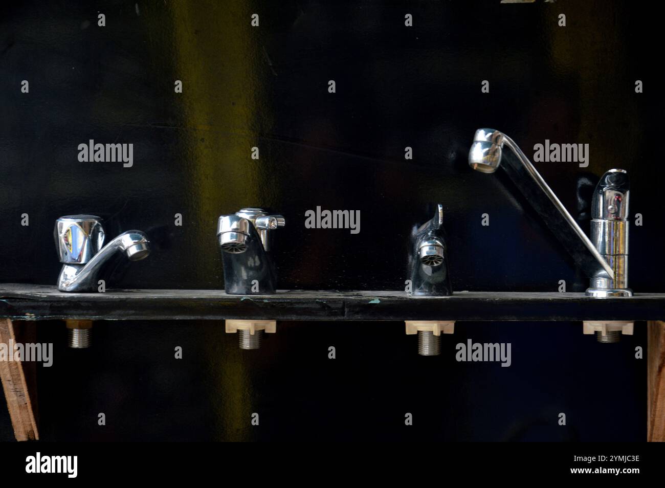 display or examples of water tap on store Stock Photo - Alamy