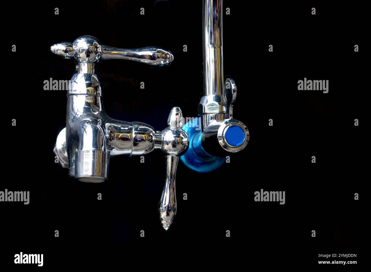 display or examples of water tap on store Stock Photo - Alamy