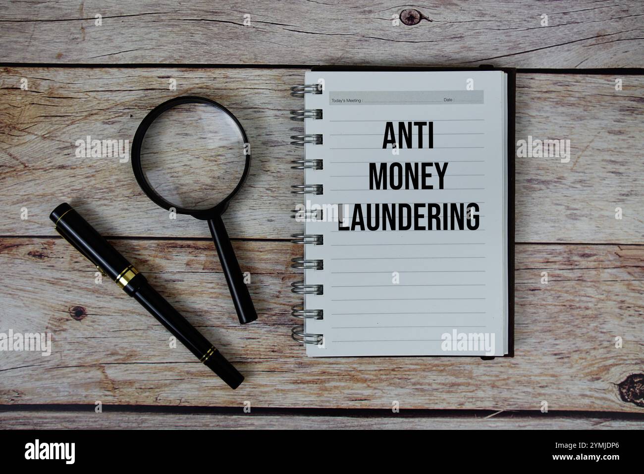 Anti Money Laundering (AML) text on notepad, Business and Financial ...