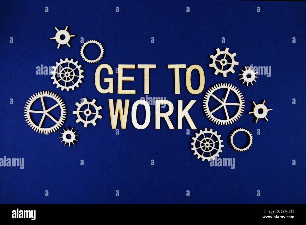 Get to Work alphabet letters with gears element on navy blue background ...