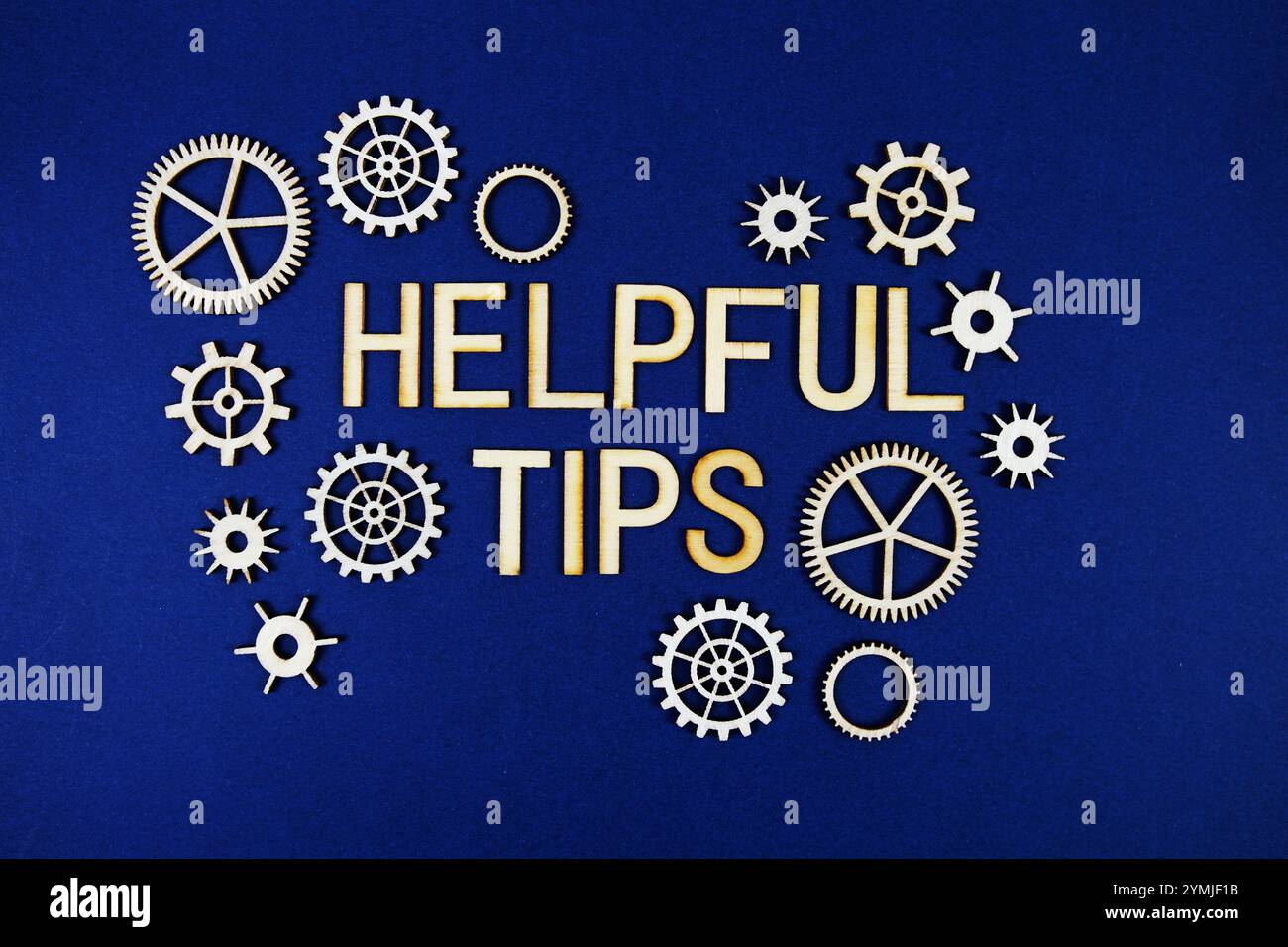 Helpful Tips alphabet letters with gears element on navy blue ...