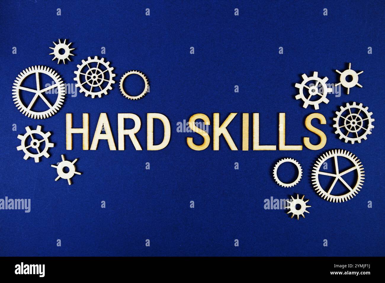Hard Skills alphabet letters with gears element on navy blue background ...