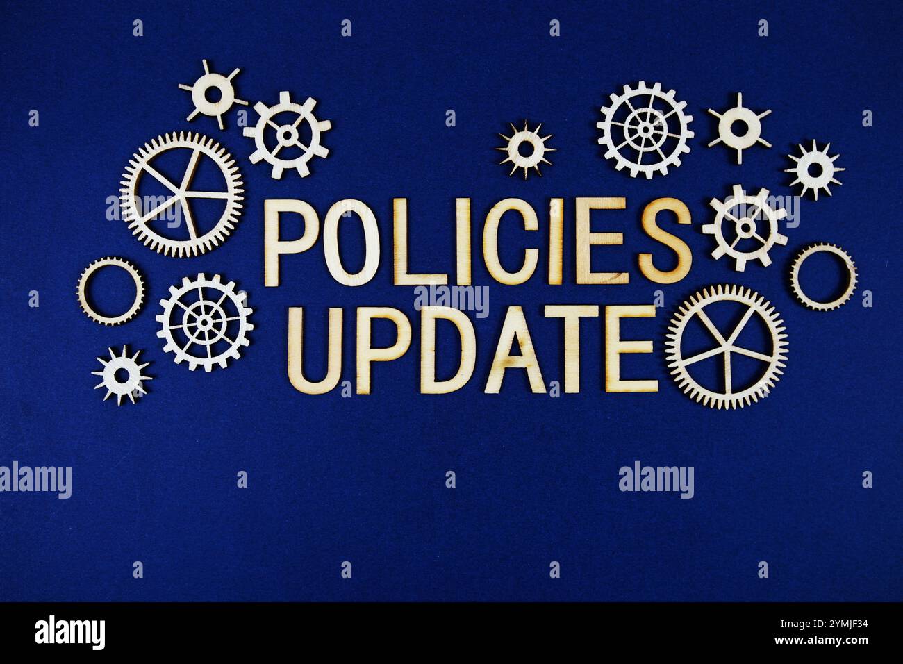 Policies Update alphabet letters with gears element on navy blue ...