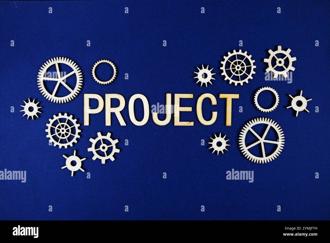 Project alphabet letters with gears element on navy blue background ...