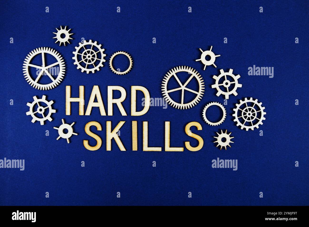 Hard Skills alphabet letters with gears element on navy blue background ...