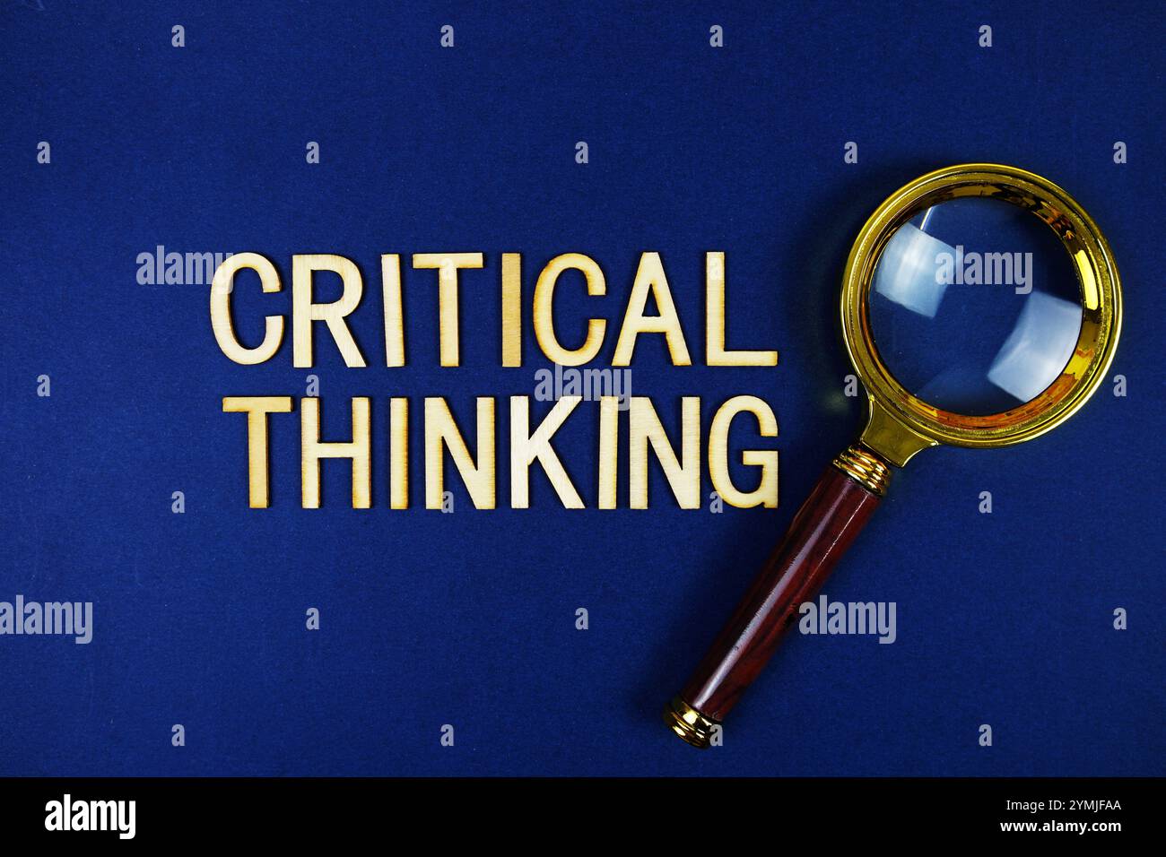 Critcal Thinking alphabet letters with gears element on navy blue ...