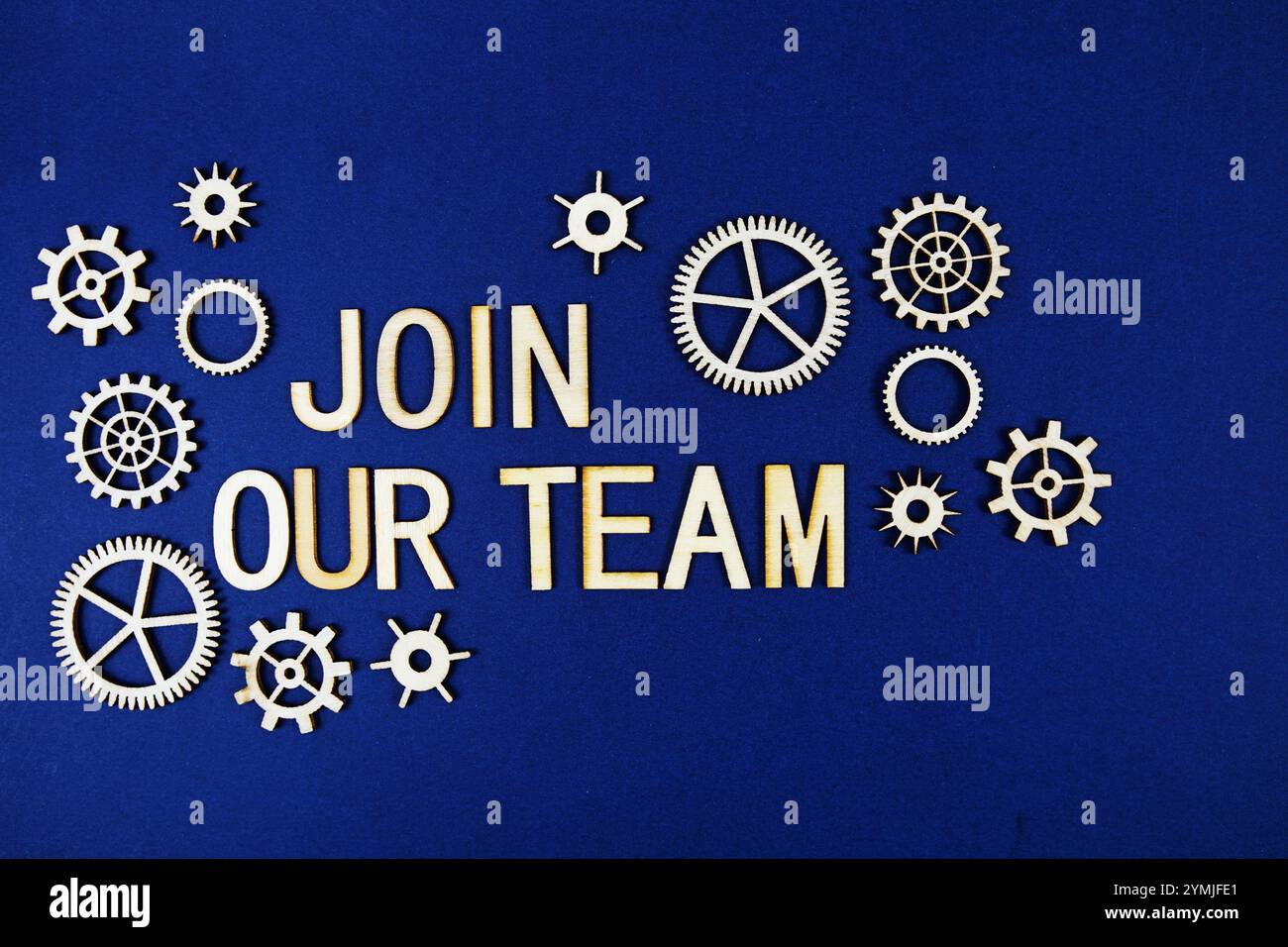 Join Our Team alphabet letters with gears element on navy blue ...