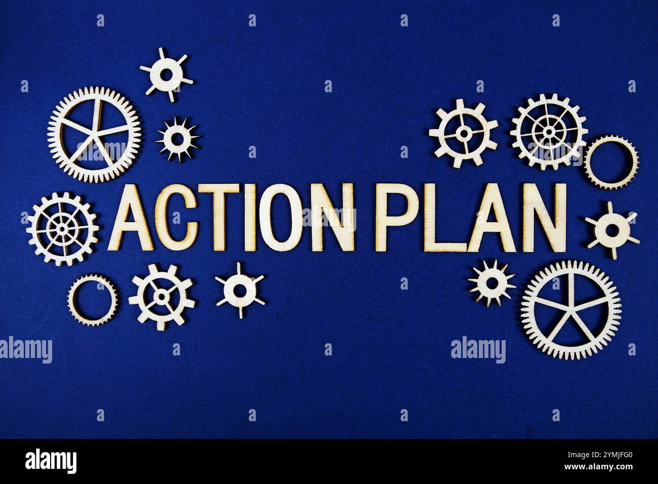 Action Plan alphabet letters with gears element on navy blue background ...