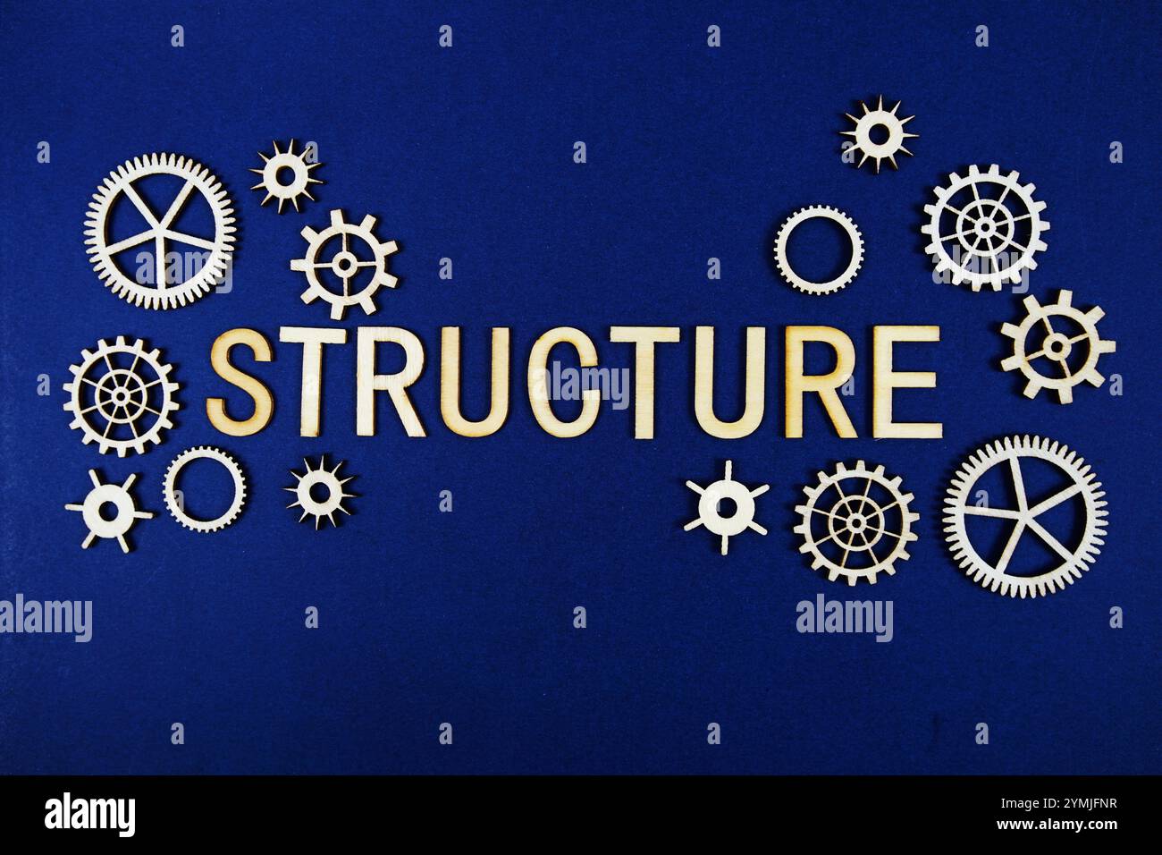 Structure alphabet letters with gears element on navy blue background ...