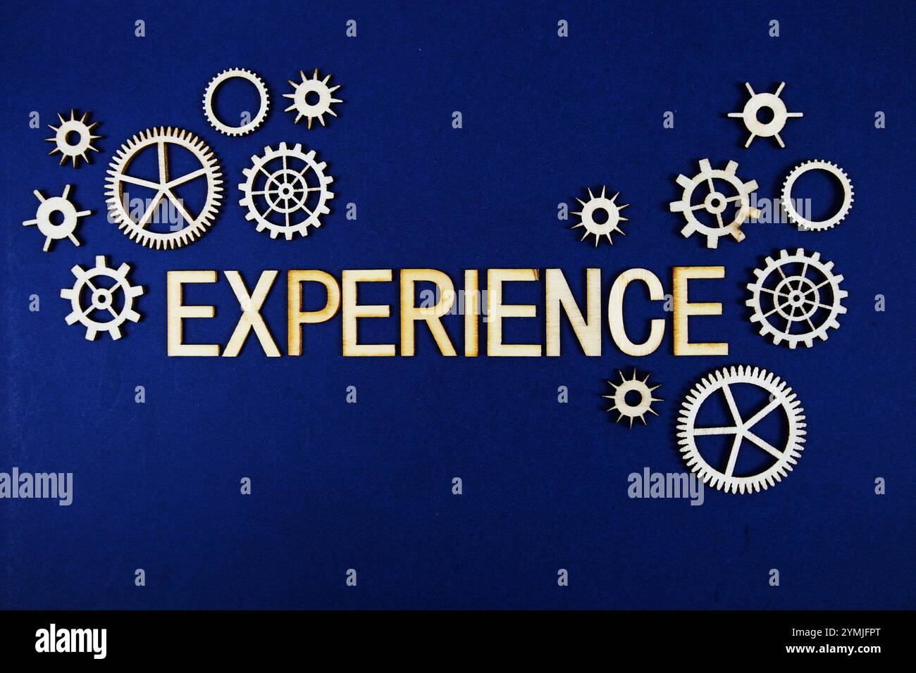 Experience alphabet letters with gears element on navy blue background ...