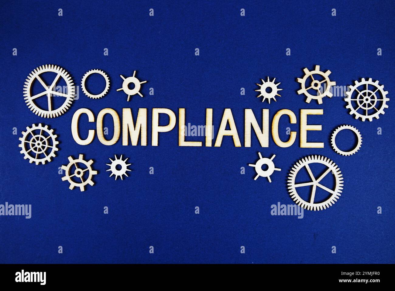 Compliance alphabet letters with gears element on navy blue background ...