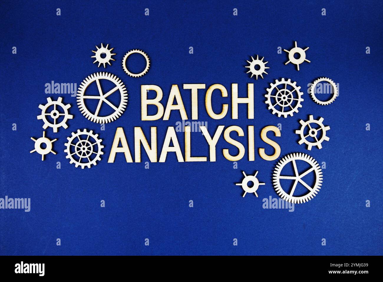 Batch Analysis alphabet letters with gears element on navy blue background Stock Photo - Alamy