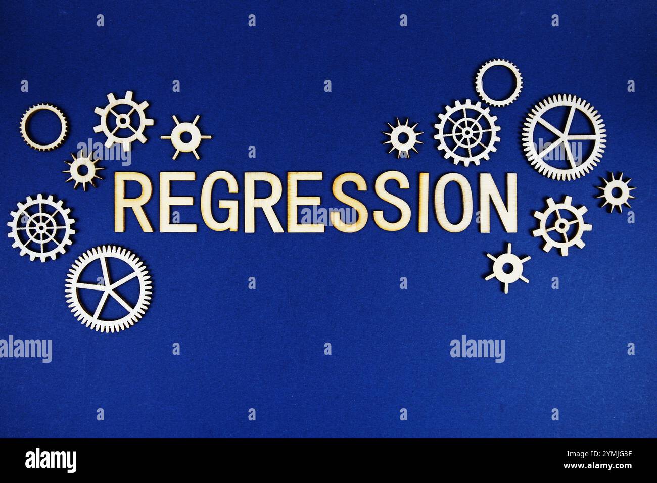 Regression alphabet letters with gears element on navy blue background ...
