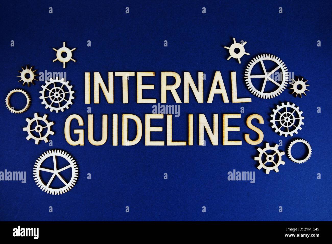 Internal Guidelines alphabet letters with gears element on navy blue ...