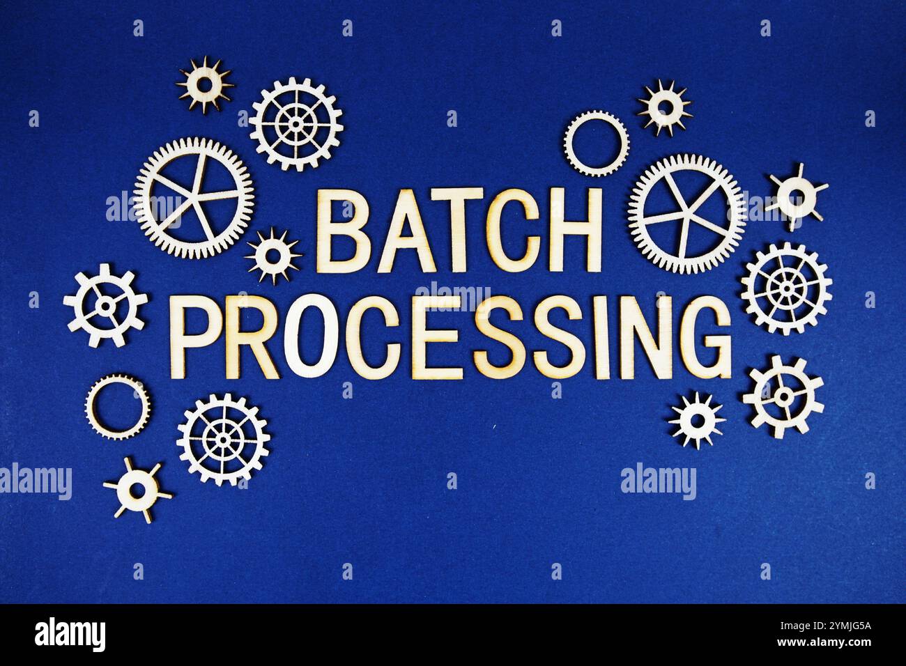 Batch Processing alphabet letters with gears element on navy blue ...