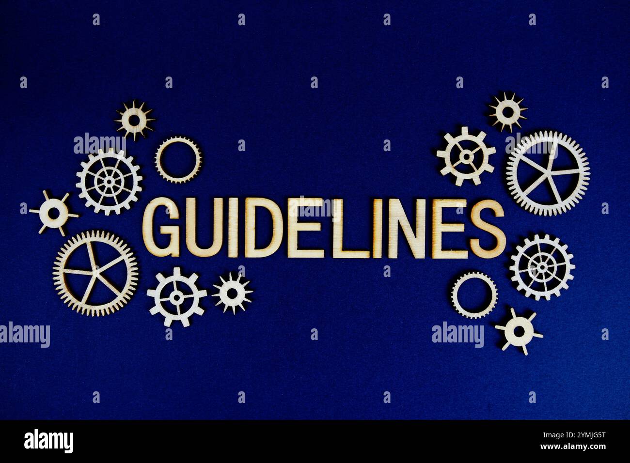 Guidelines alphabet letters with gears element on navy blue background ...