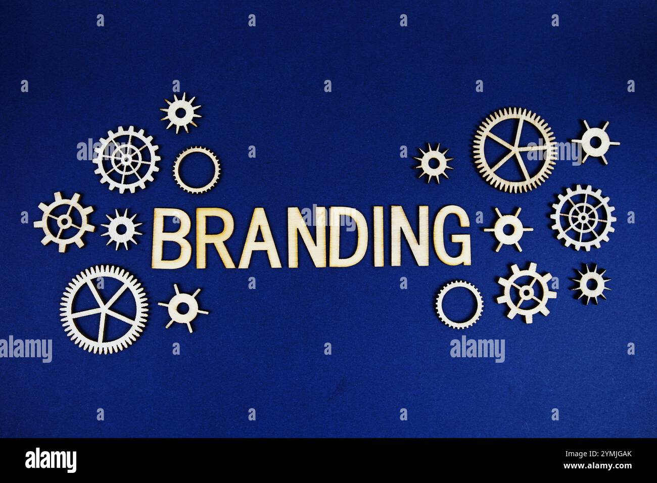 Branding alphabet letters with gears element on navy blue background ...