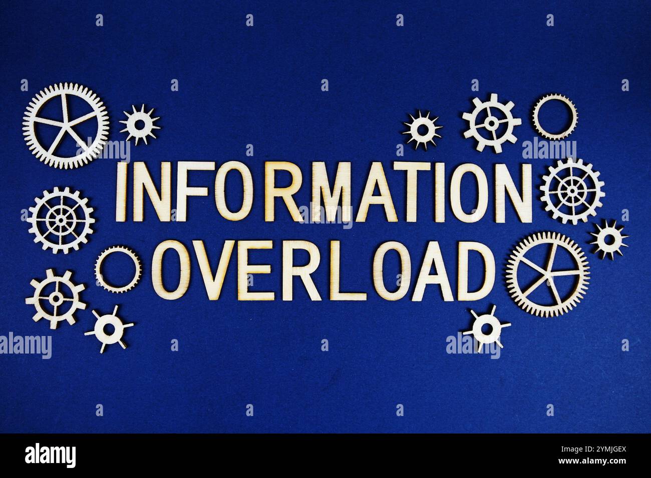 Information Overload alphabet letters with gears element on navy blue ...