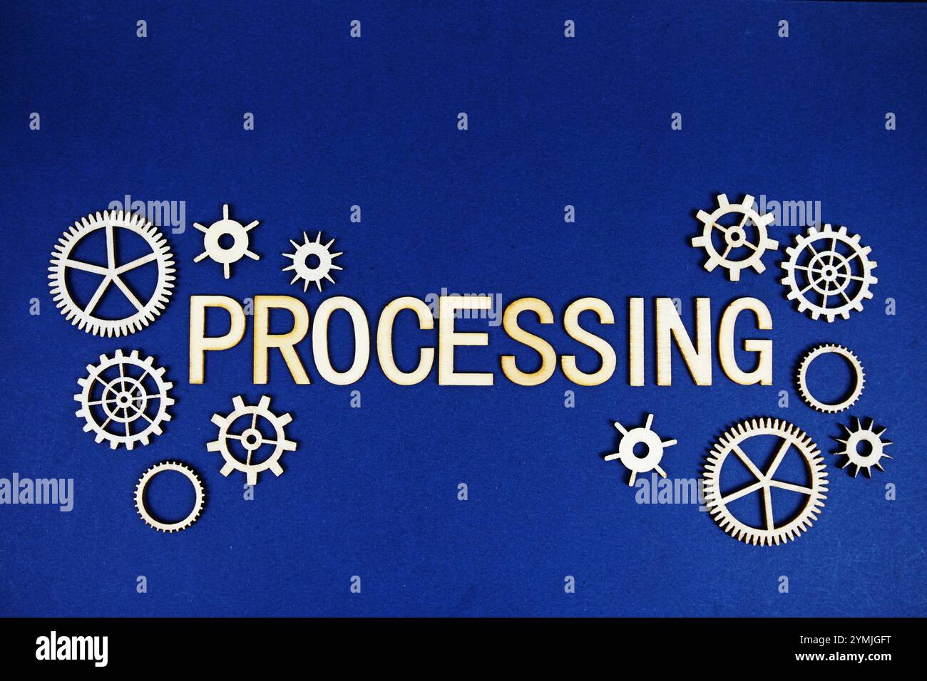 Processing alphabet letters with gears element on navy blue background ...