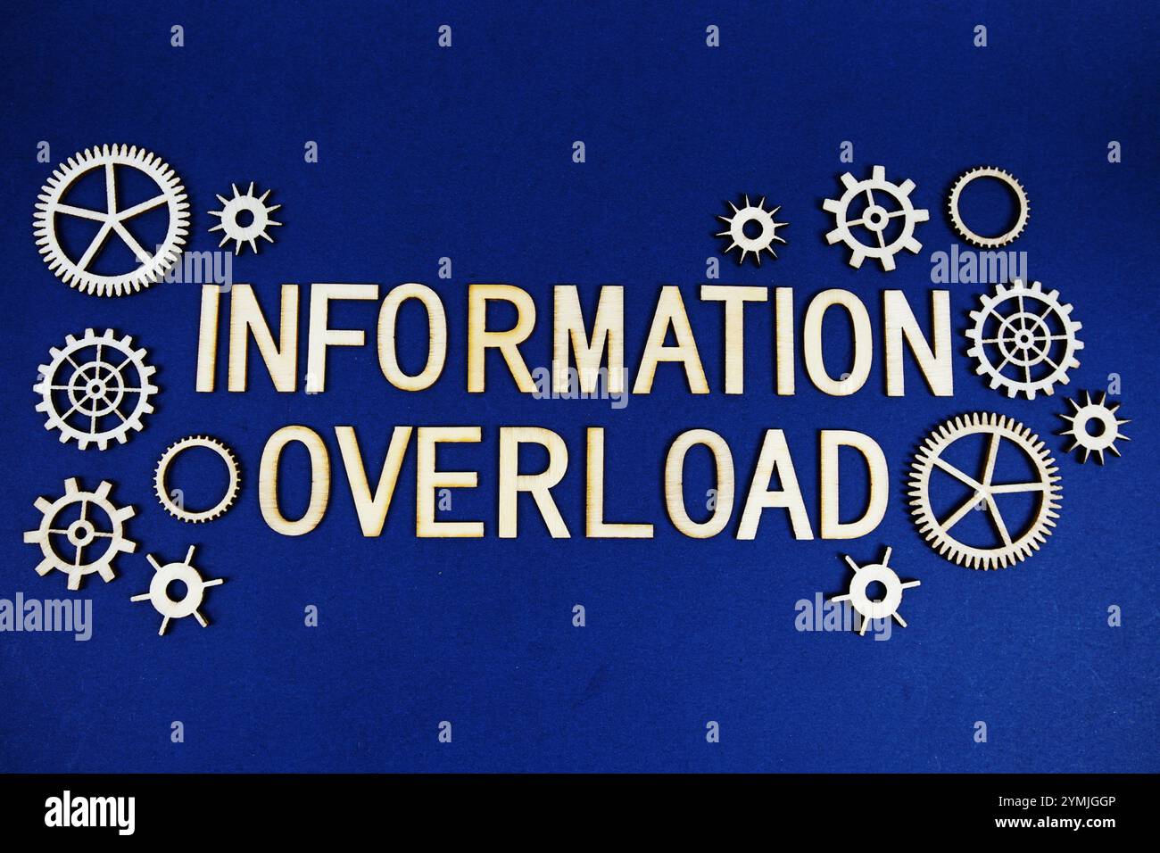 Information Overload alphabet letters with gears element on navy blue ...