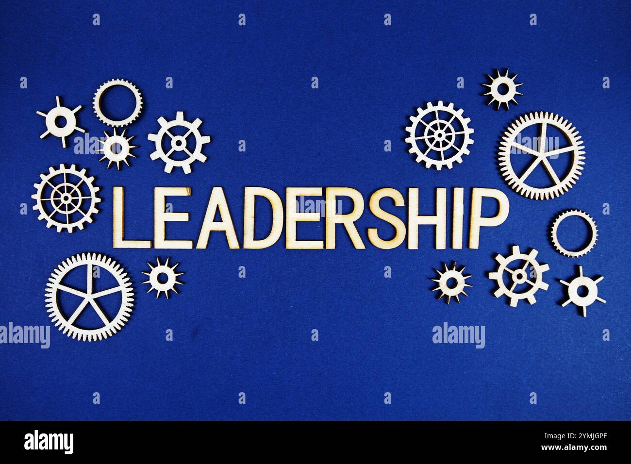 Leadership alphabet letters with gears element on navy blue background ...