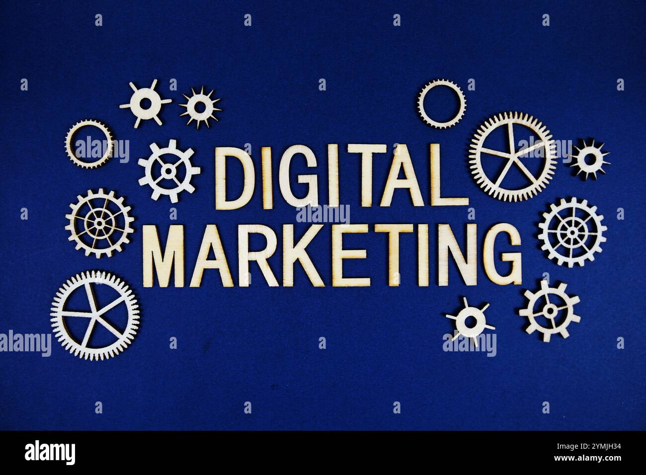Digital Marketing alphabet letters with gears element on navy blue ...