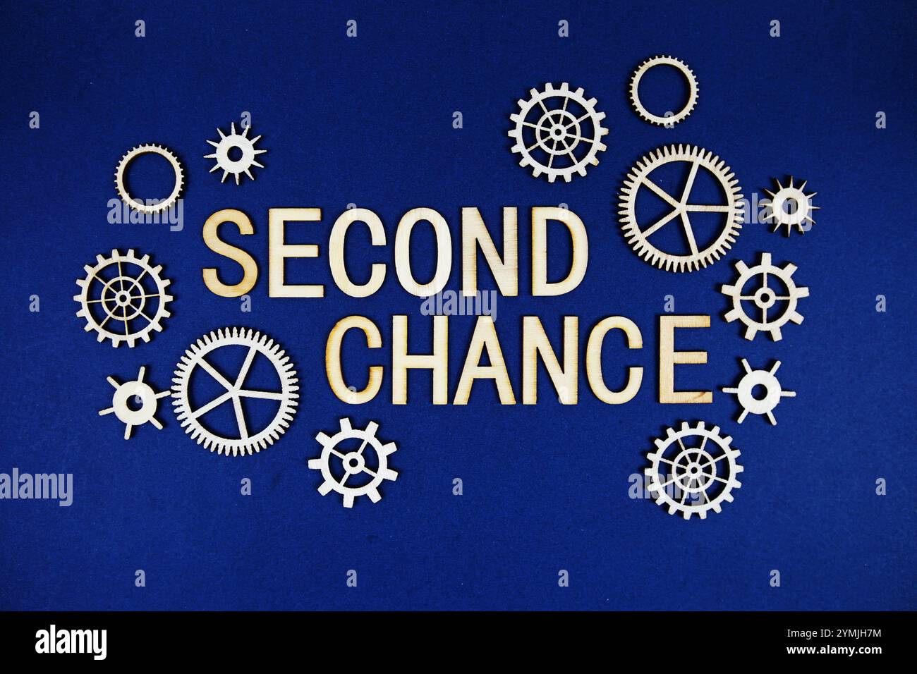 Second Chance alphabet letters with gears element on navy blue ...