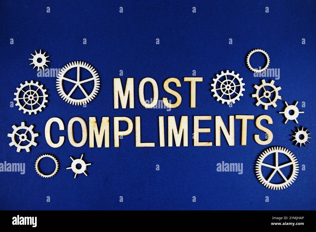 Most Compliments alphabet letters with gears element on navy blue ...