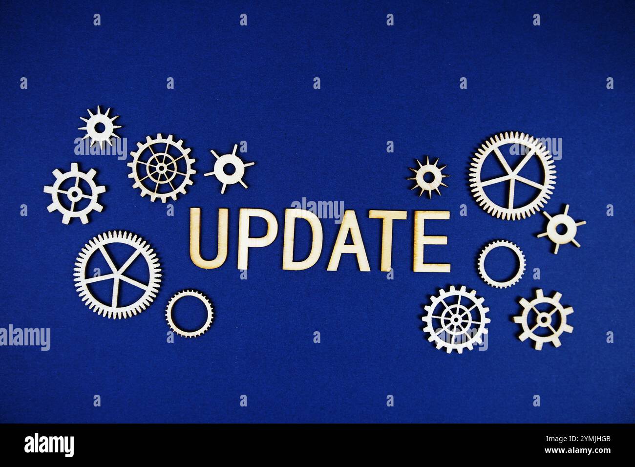 Update alphabet letters with gears element on navy blue background ...
