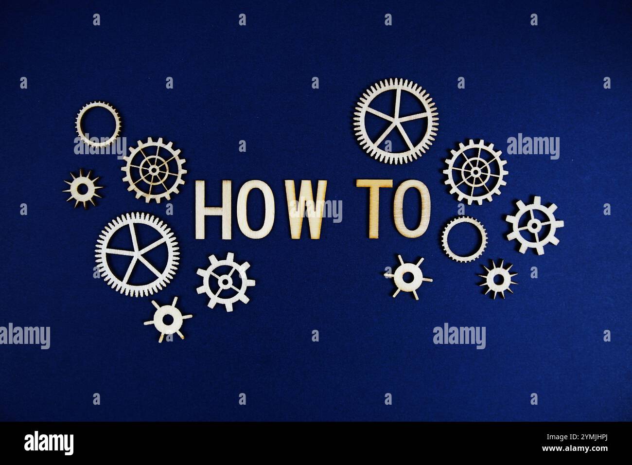 How To alphabet letters with gears element on navy blue background ...