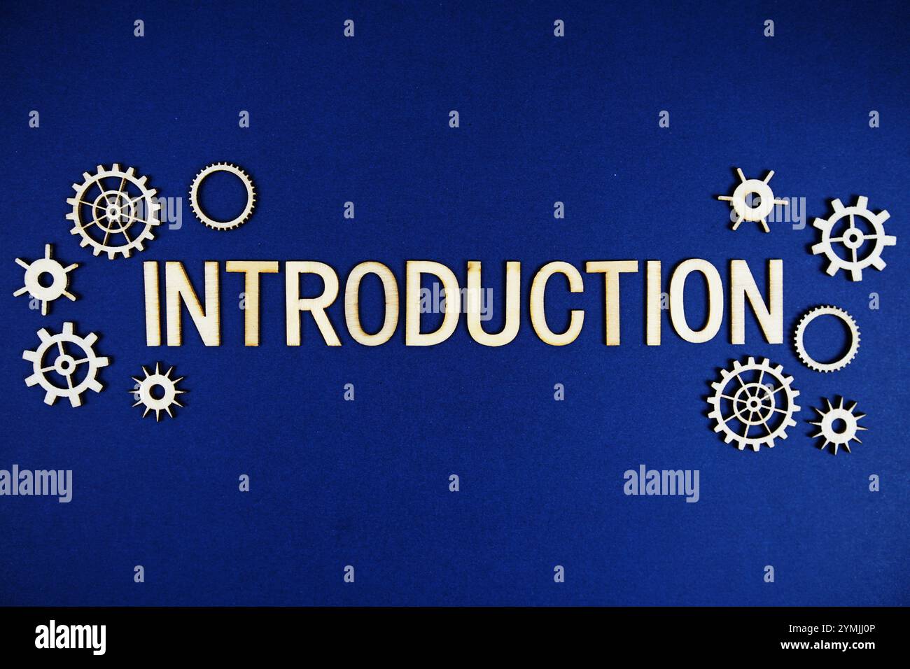 Introduction alphabet letters with gears element on navy blue ...