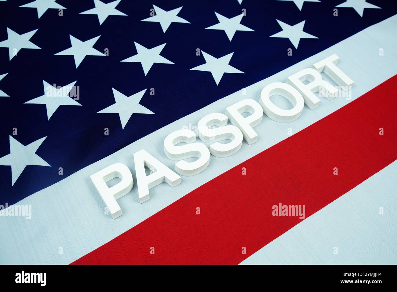 Passport alphabet letters with USA flag background Stock Photo - Alamy