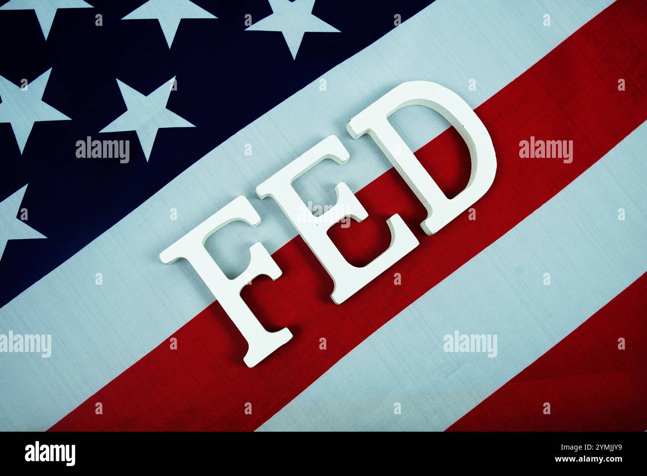 The Federal Reserve (FED) alphabet letters with USA flag background ...