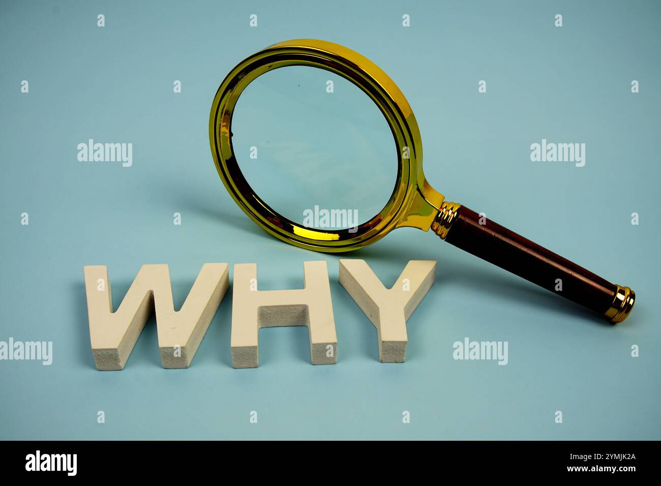 Why? word with magnifying glass on blue background Stock Photo - Alamy