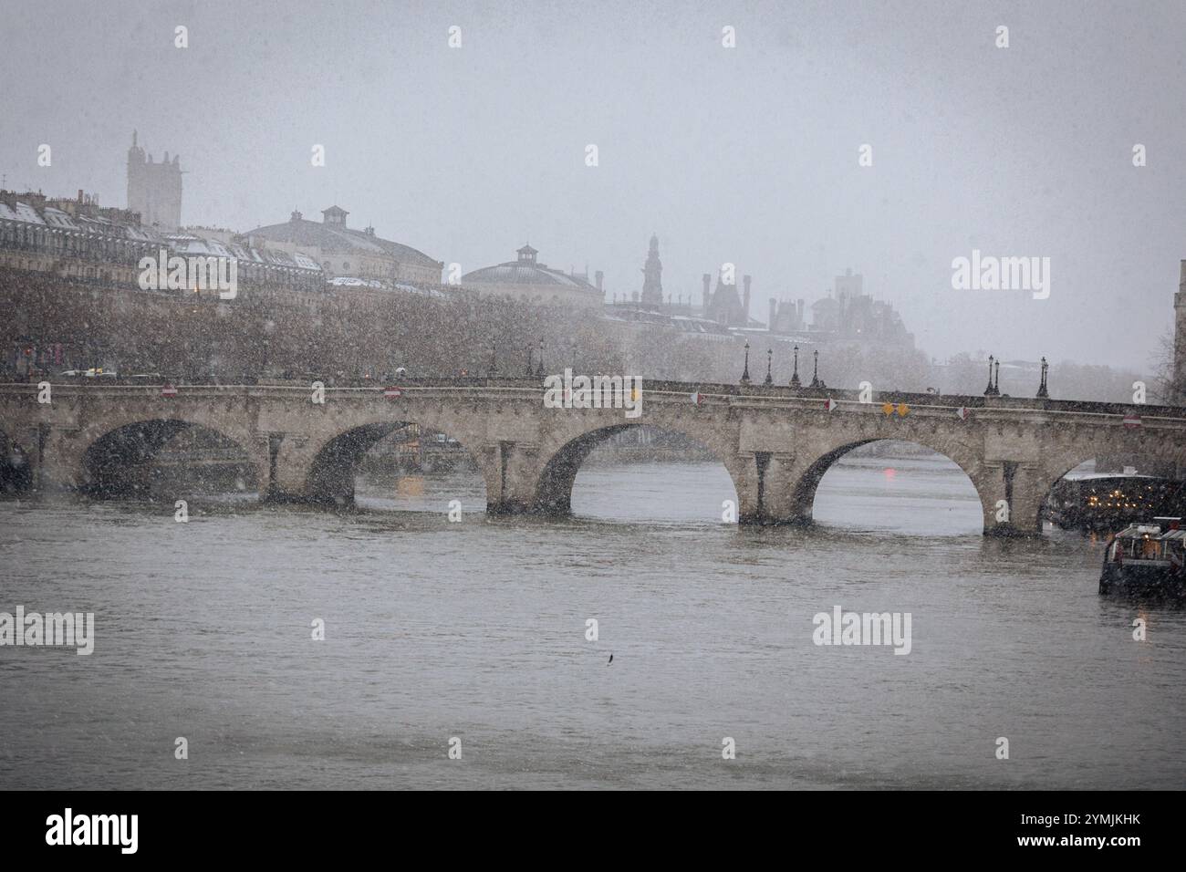 View of the Neuf Bridge, during the snowfall of Storm Caetano. Storm ...