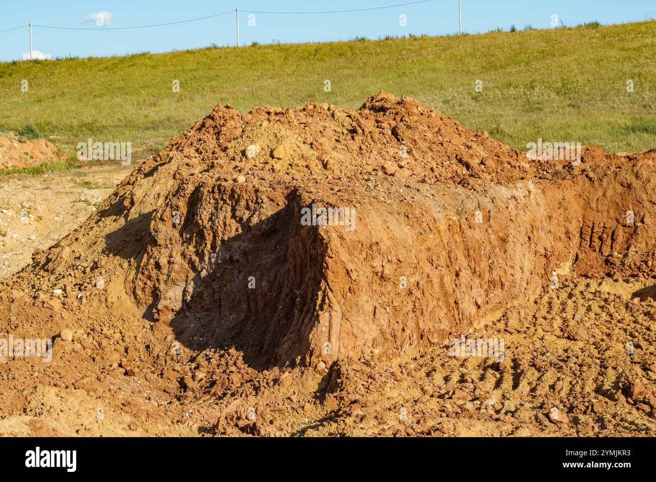 A pile of clay soil, a waste dump at a quarry Stock Photo - Alamy