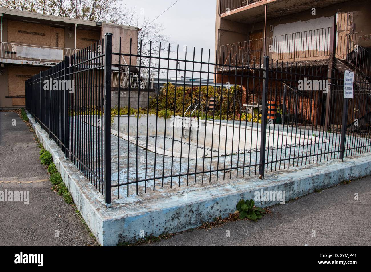 Outdoor swimming pool at the abandoned dilapidated motel waiting for ...