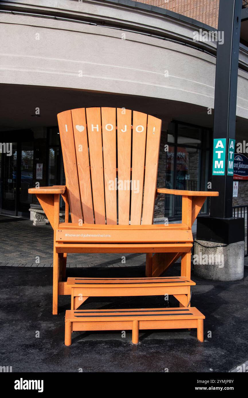 Orange oversize Adirondack chair advertising Howard Johnson Hotel on ...