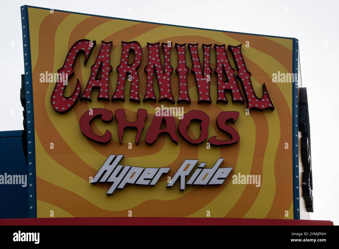 Carnival chaos hyper ride sign on Clifton Hill in Niagara Falls ...