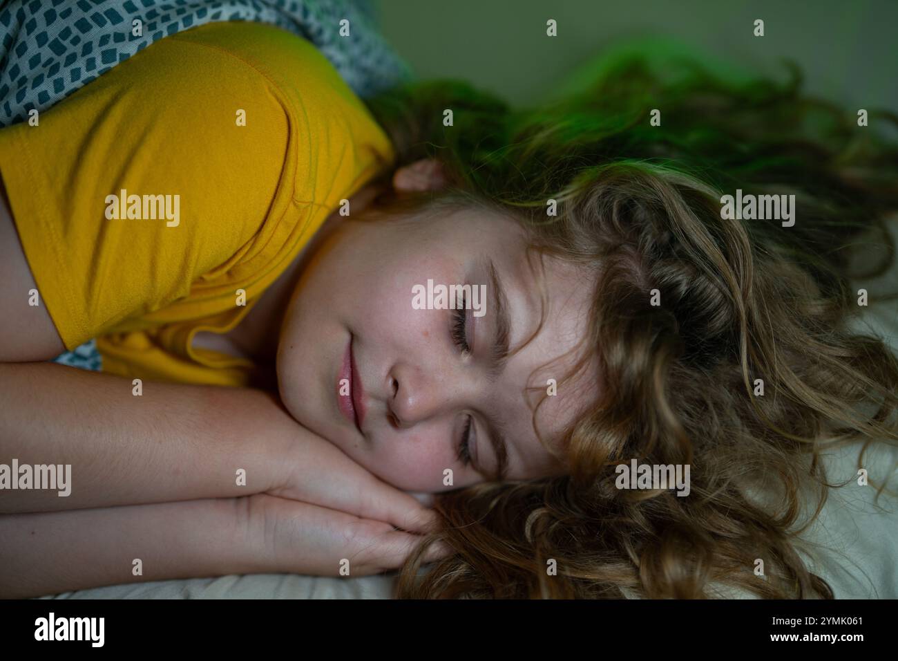 Child sleeping in a bed. Cute kid sleep. Kids pillow and blanket for ...