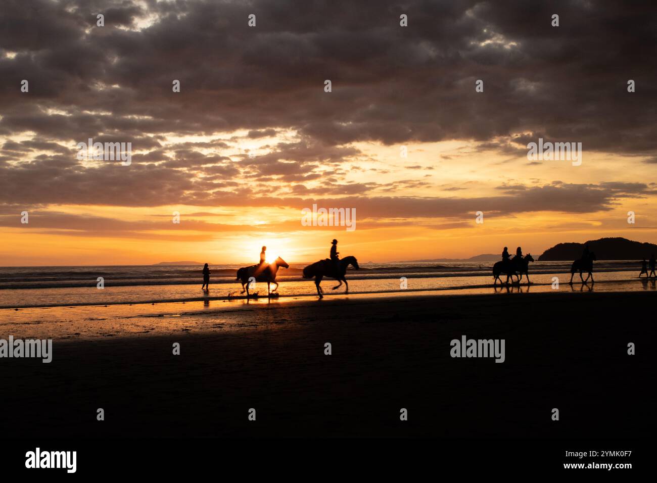 Horseback riding on tropical beach hi-res stock photography and images ...