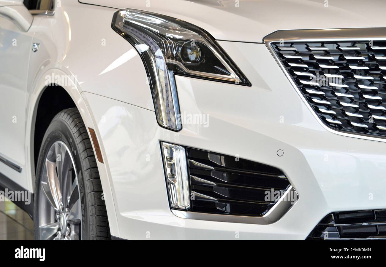 Cadillac car at auto dealership Stock Photo - Alamy
