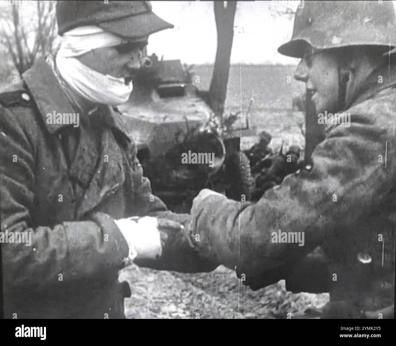 World War Two German Soldier dresses the wound of a Comrade during the ...