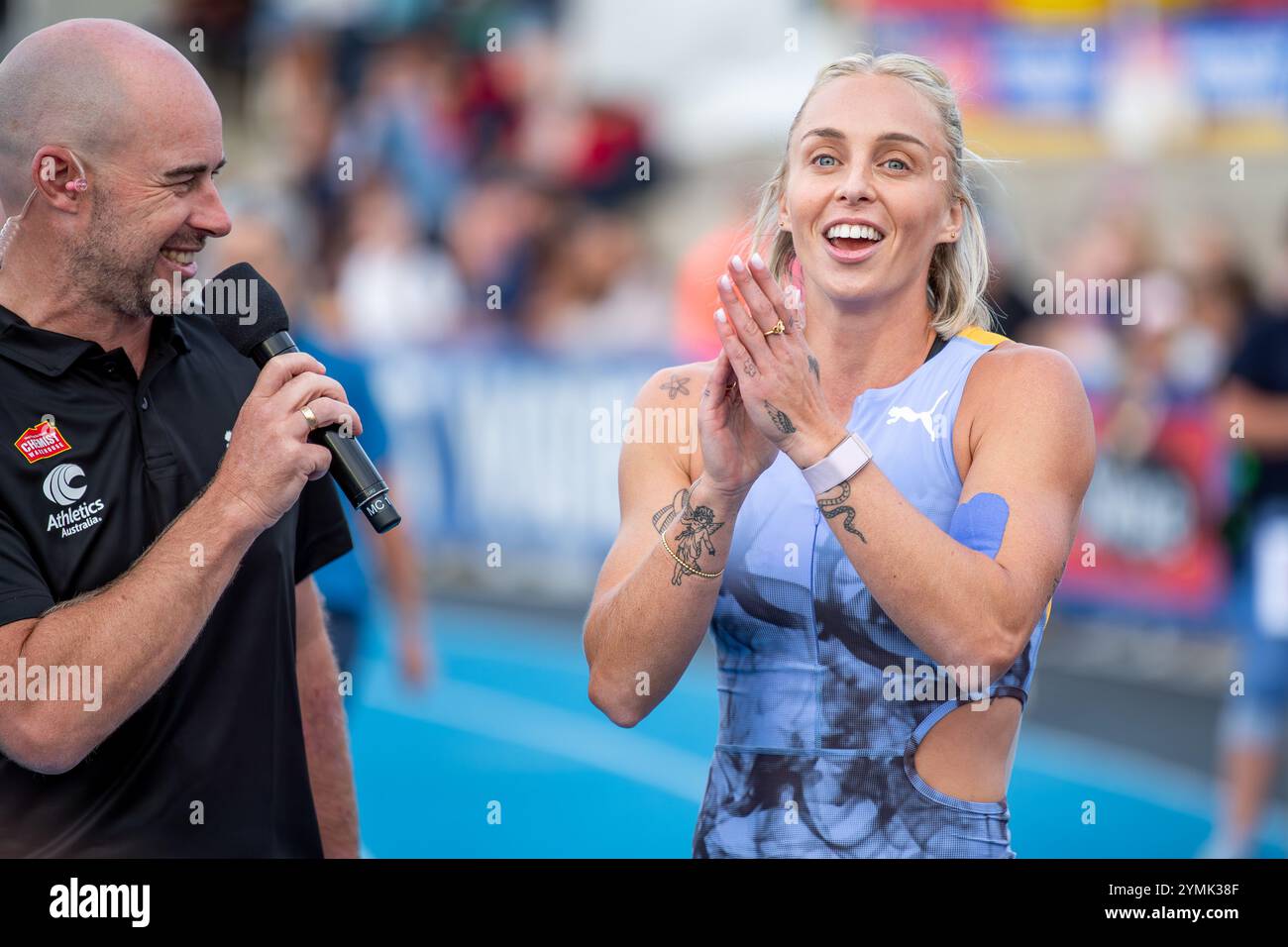 Olympian Liz Clay gives an interview after her win in the Women's 100m ...