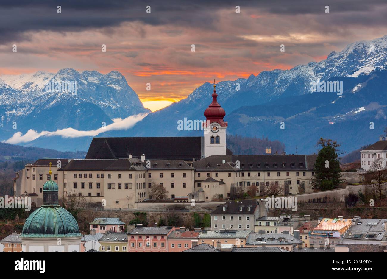 A striking sunset view of Nonnberg Abbey in Salzburg, Austria, with its ...